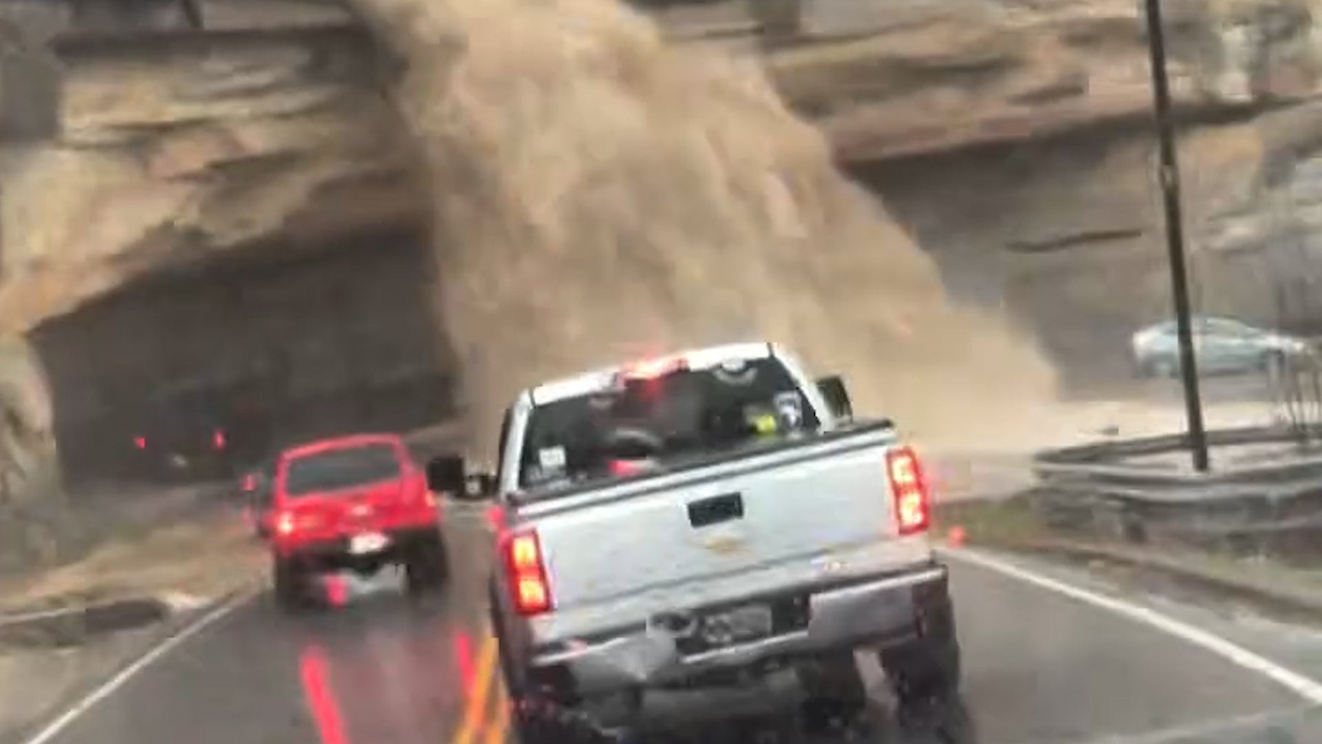Flash Floods Create Raging Waterfall Over Indiana Drivers
