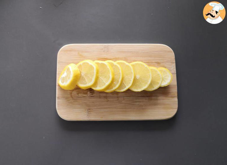 Homemade flavored water with lemon, basil and raspberry