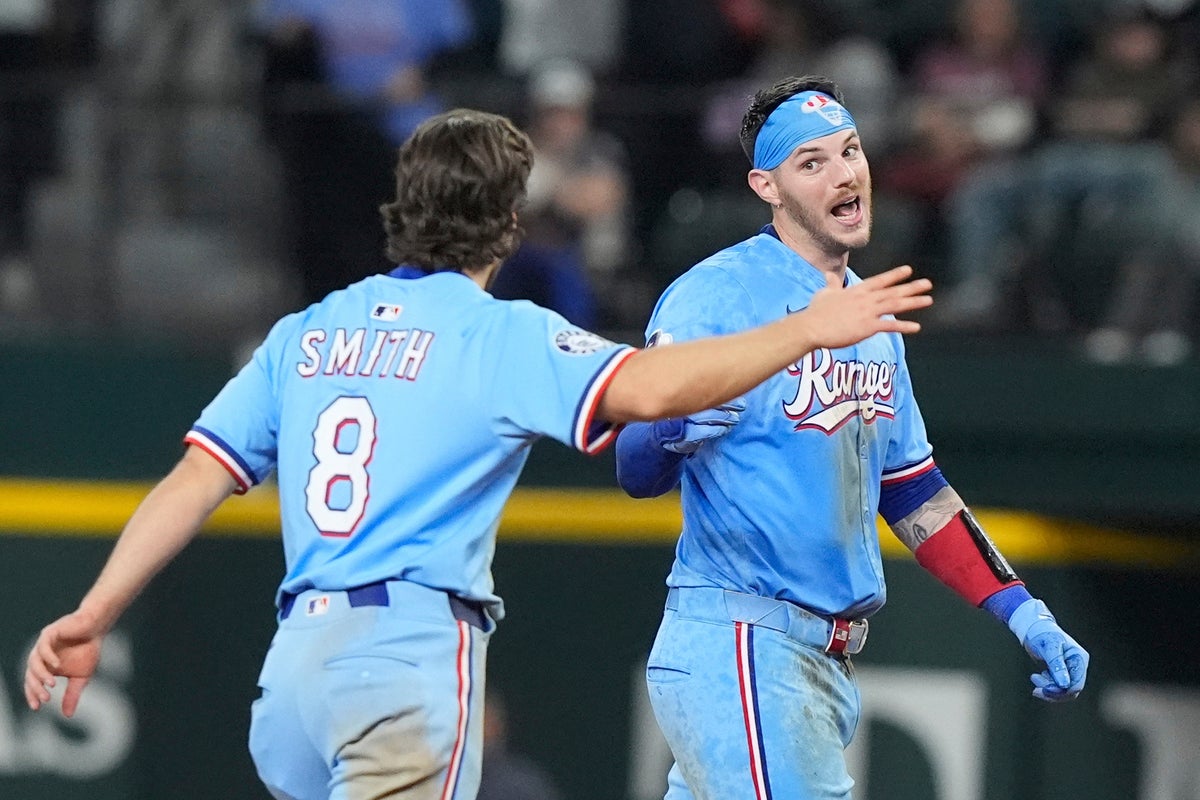 Sencillo de Heim en 9ª da victoria a Rangers 4-3 sobre Rays y extiende ...