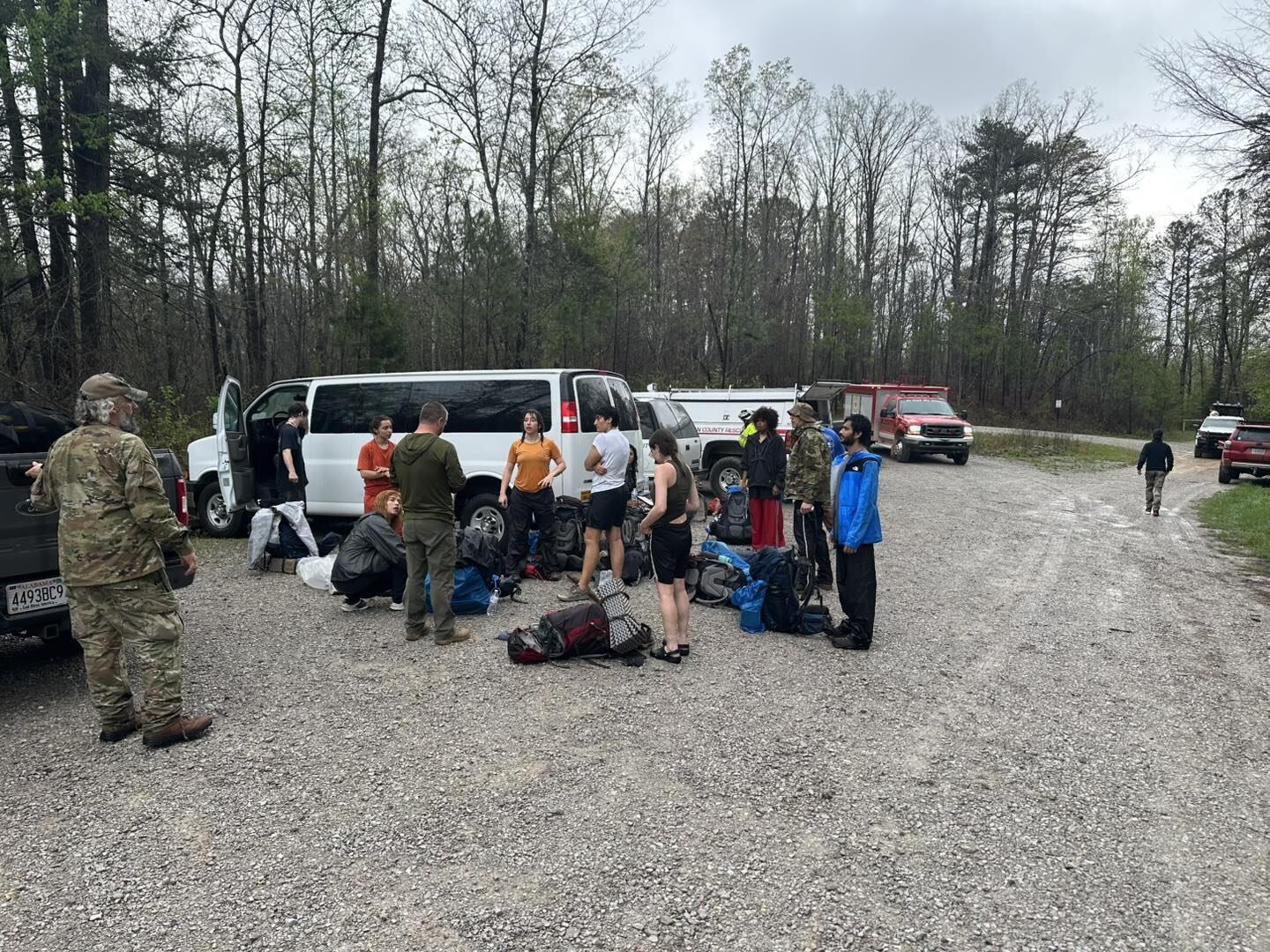 Emergency crews rescue 10 college students trapped in floodwaters in ...