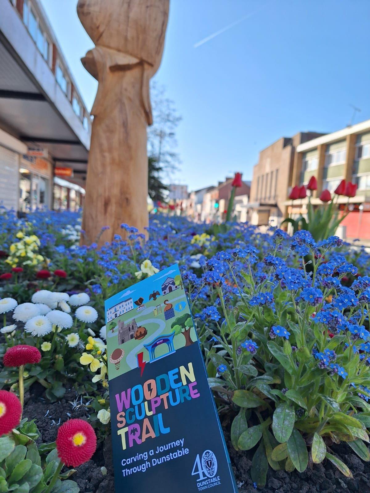 Six wooden sculptures unveiled in Dunstable reflecting the town’s history
