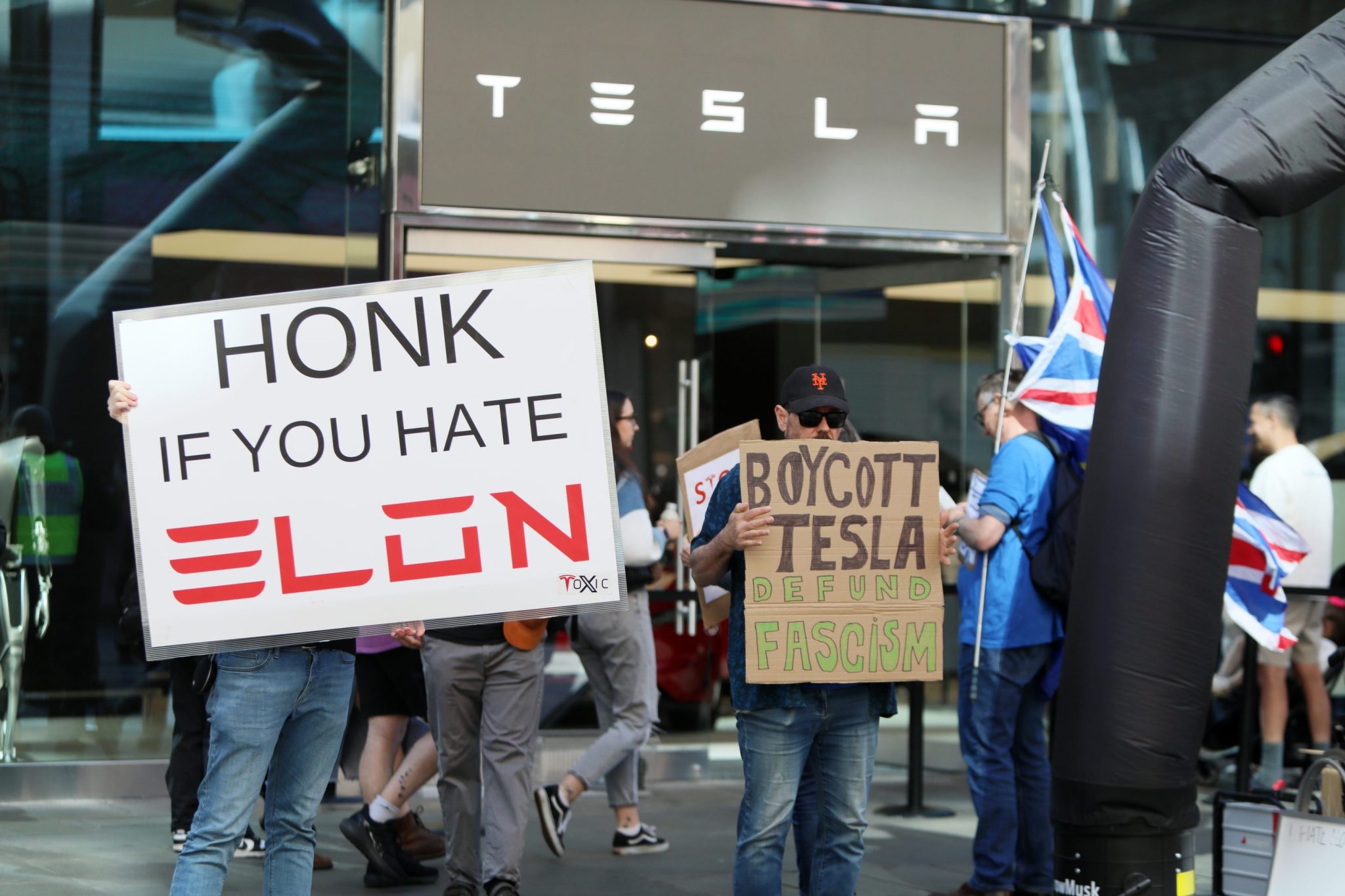 Wall Street’s biggest Tesla bull just raised the white flag, blaming ...