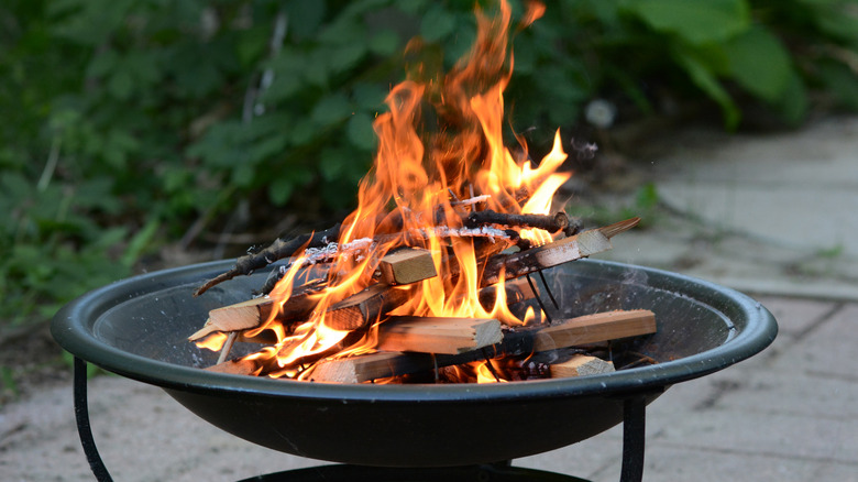 Why Your Backyard Fire Pit Is Making Your Neighbor Angry