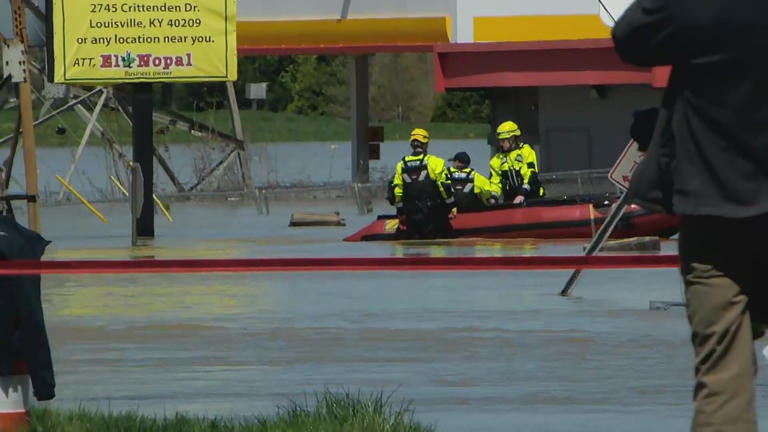 Louisville Fire Department assisting with evacuations at Candlewood Suites