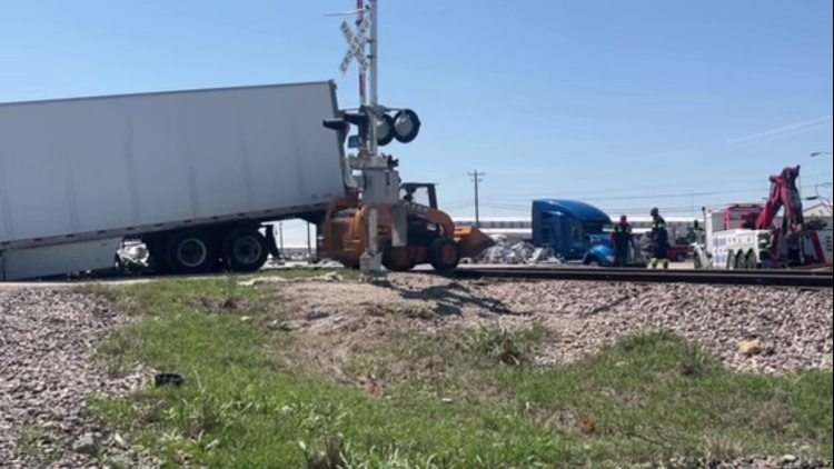 'It just went boom' | Train crashed into semi truck, spilling beer ...