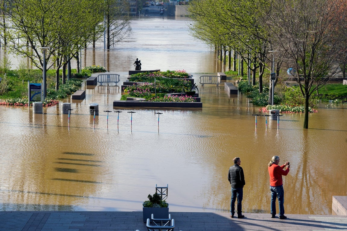 Historic flooding leaves homes underwater days after storms, in photos