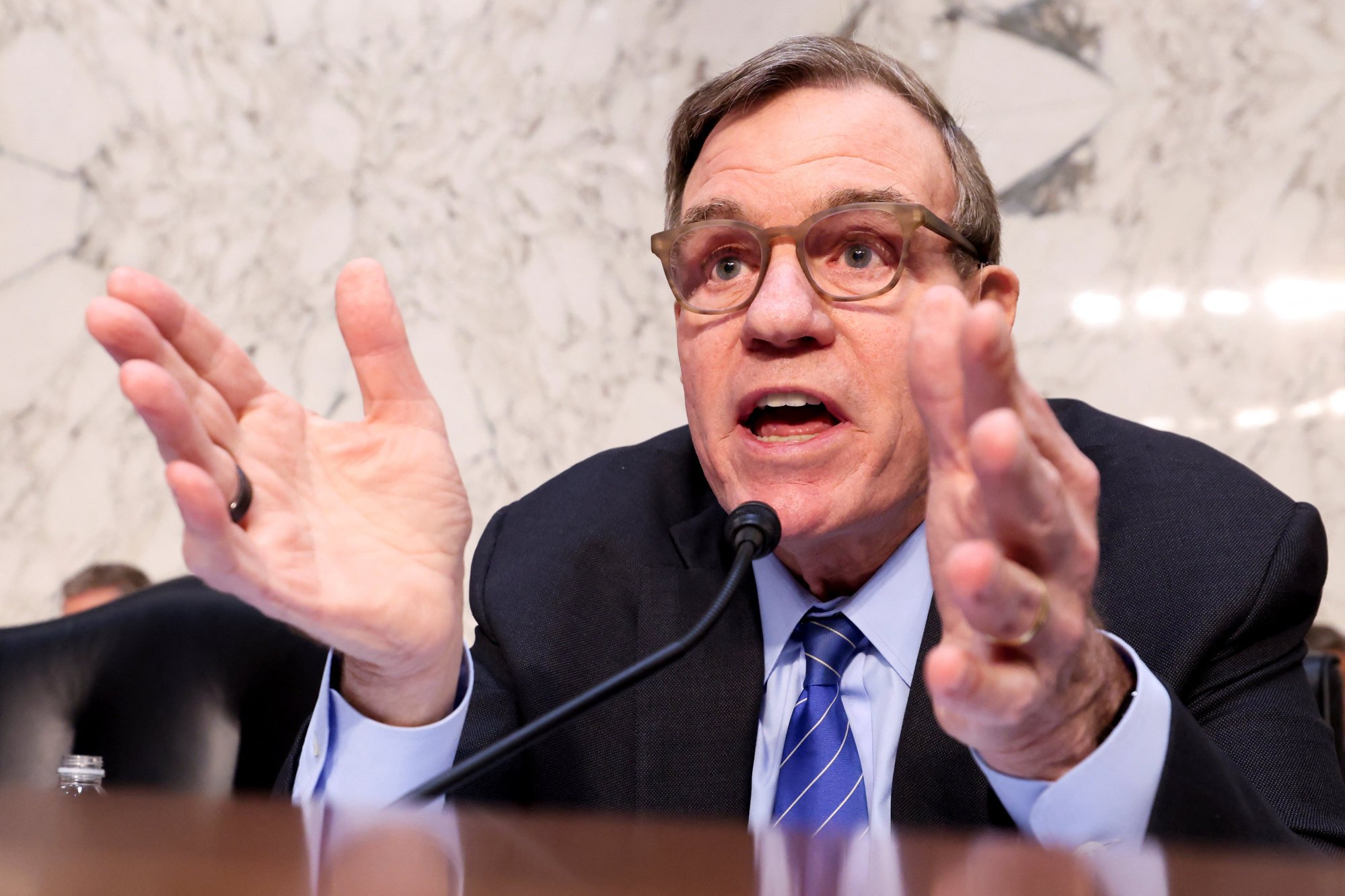 Senator Mark Warner says new Trump TikTok extension may violate law