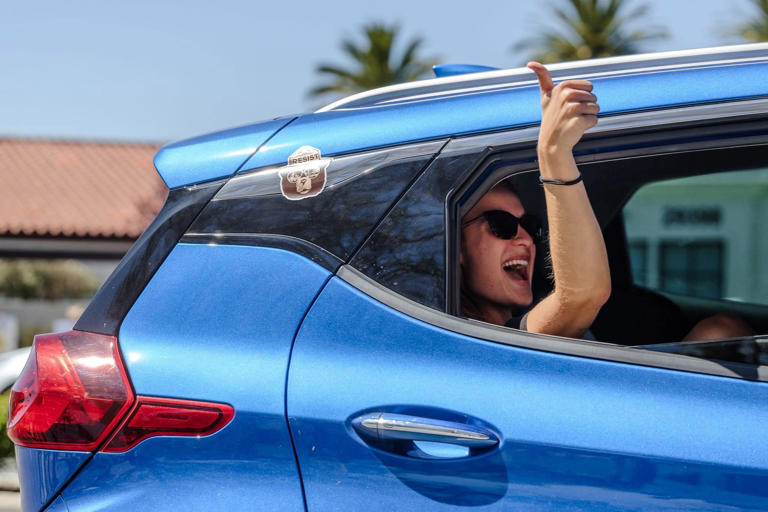 'Hands Off' Protestors Line Murrieta, Temecula City Streets Saturday