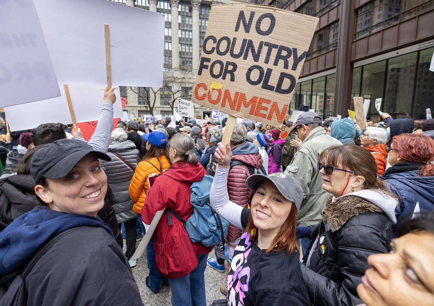14 eye-catching ‘Hands Off’ protest signs from anti-Trump demonstrations
