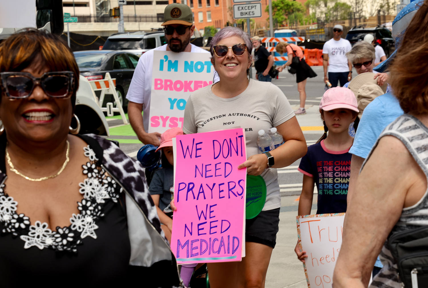 14 eye-catching ‘Hands Off’ protest signs from anti-Trump demonstrations
