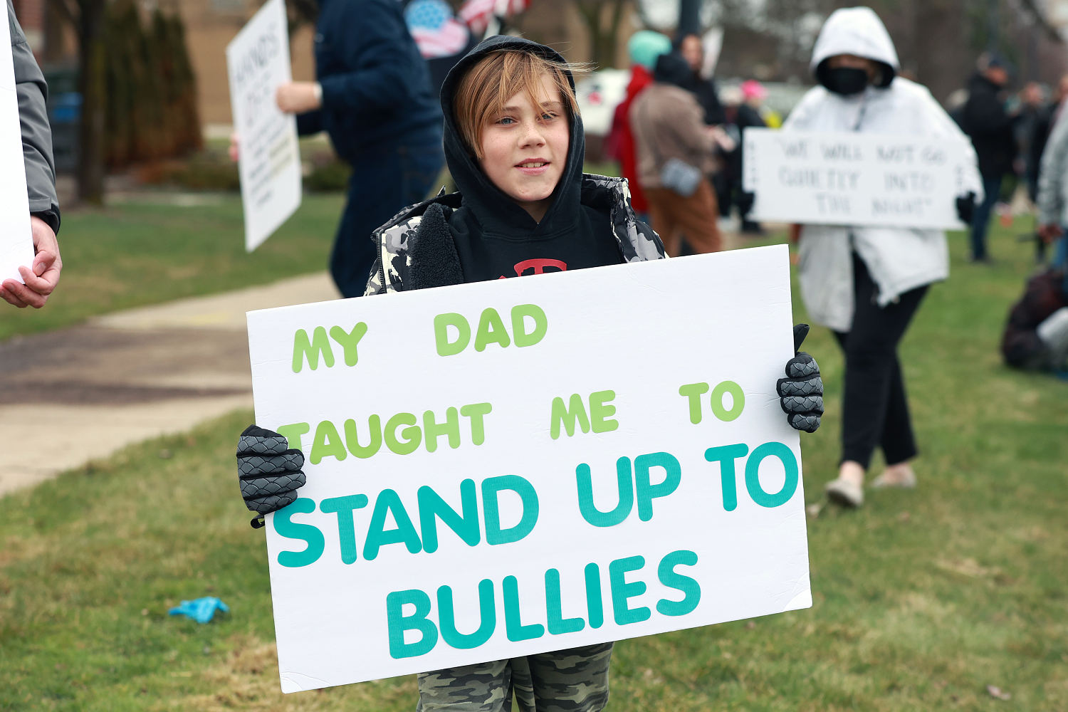 14 eye-catching ‘Hands Off’ protest signs from anti-Trump demonstrations
