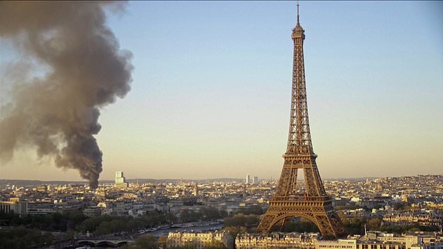 Plumes of black smoke rise over Paris after 'major' fire erupts