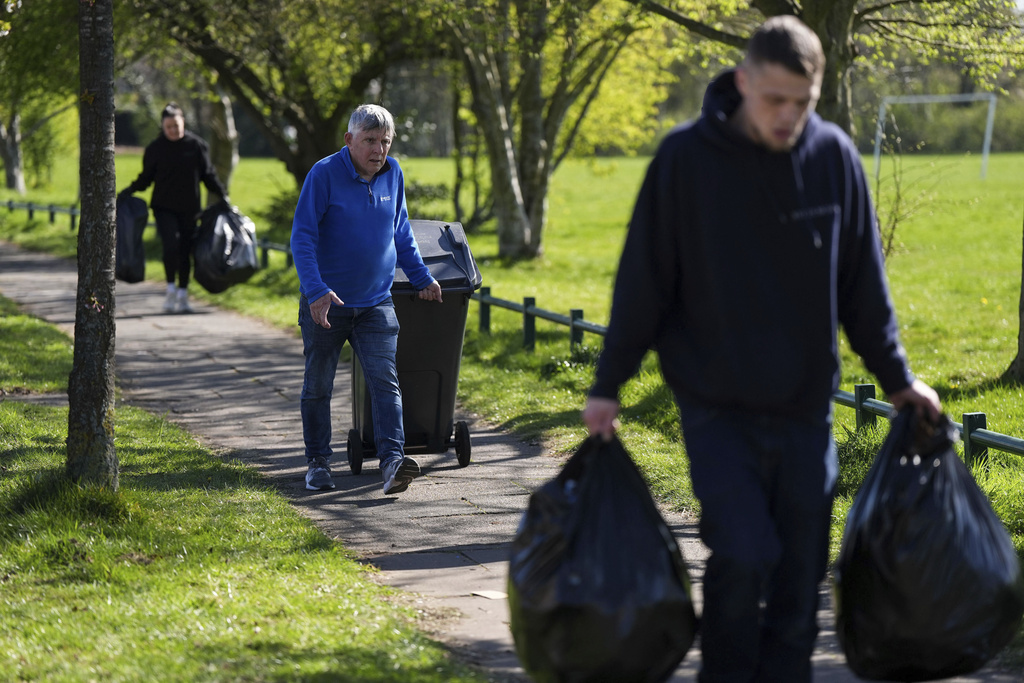 Garbage piles up on Birmingham's streets as a sanitation strike in the ...