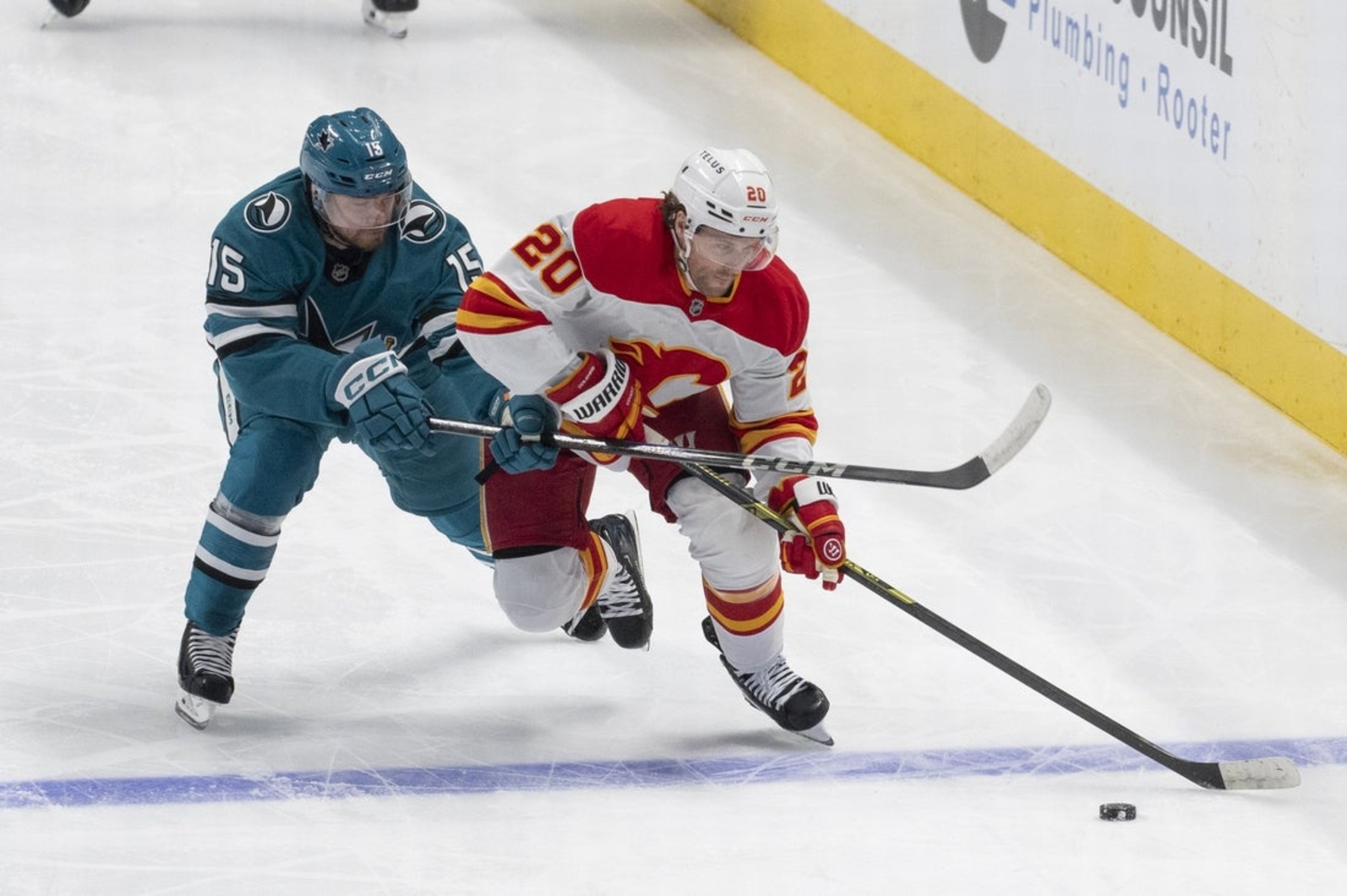 Flames score three in third to take down Sharks