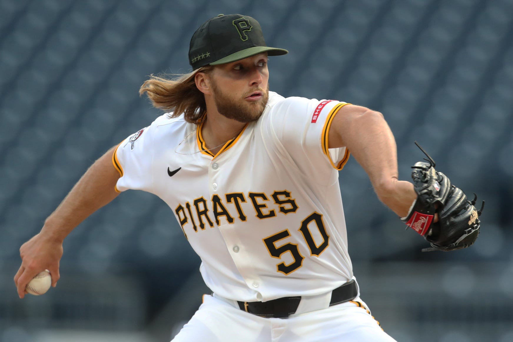 Mlodzinski 1st win as starter, Bucs season high in runs