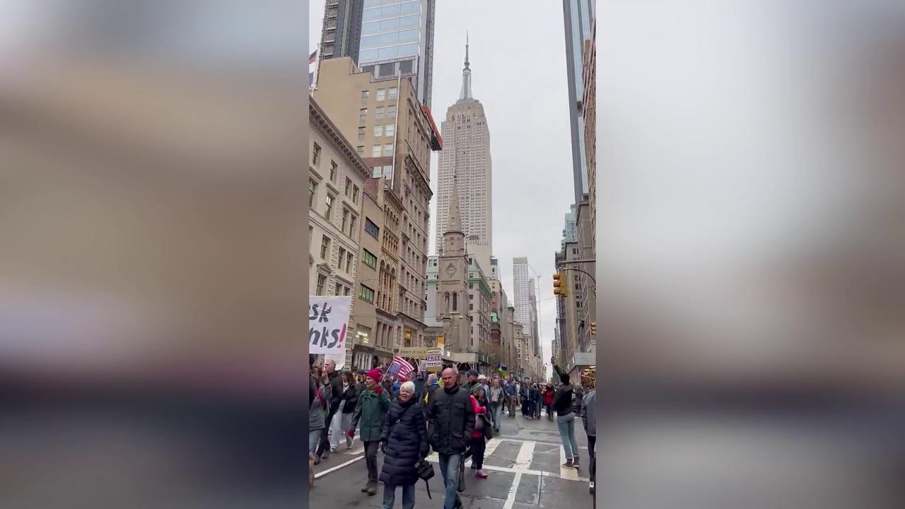 Protesters in New York march against Trump's anti-corruption drive