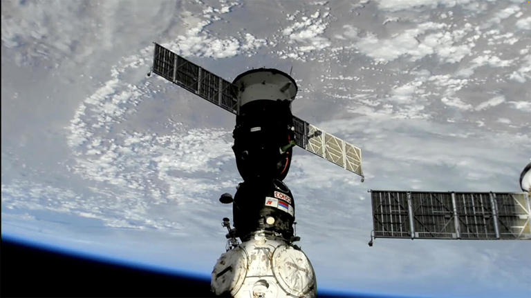 Rocket carrying NASA's Jonny Kim, 2 cosmonauts docks with space station