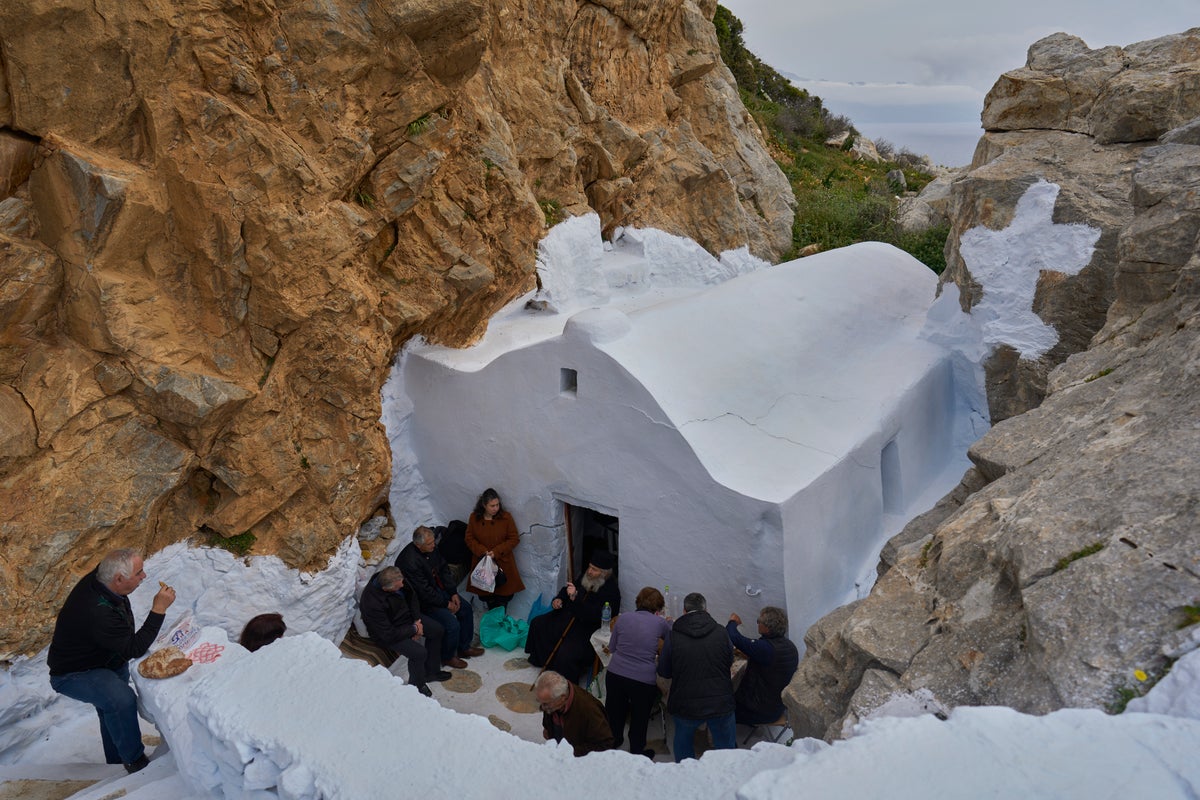 The monk who lives in the cliffs of a Greek tourist island