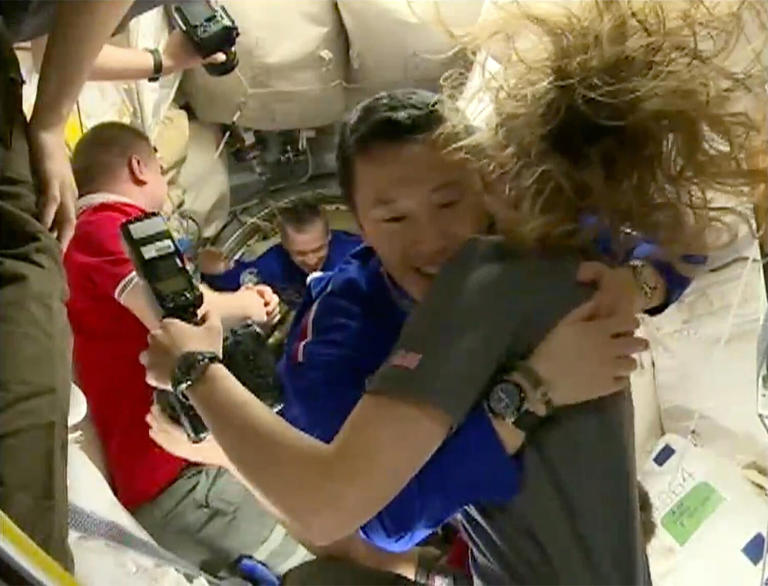 Rocket carrying NASA's Jonny Kim, 2 cosmonauts docks with space station