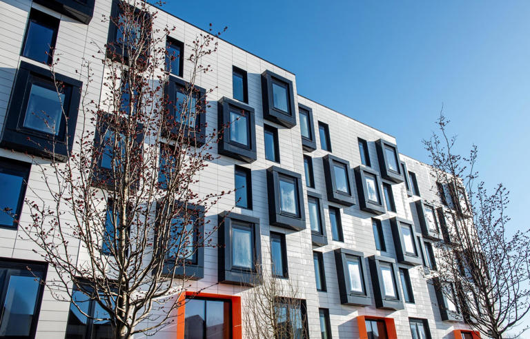 Completed apartments and a new hub for civic square – Port Loop ...