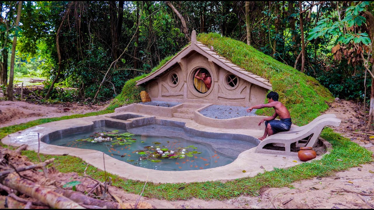 Building a fish pond in front of our grass-roof hobbit house