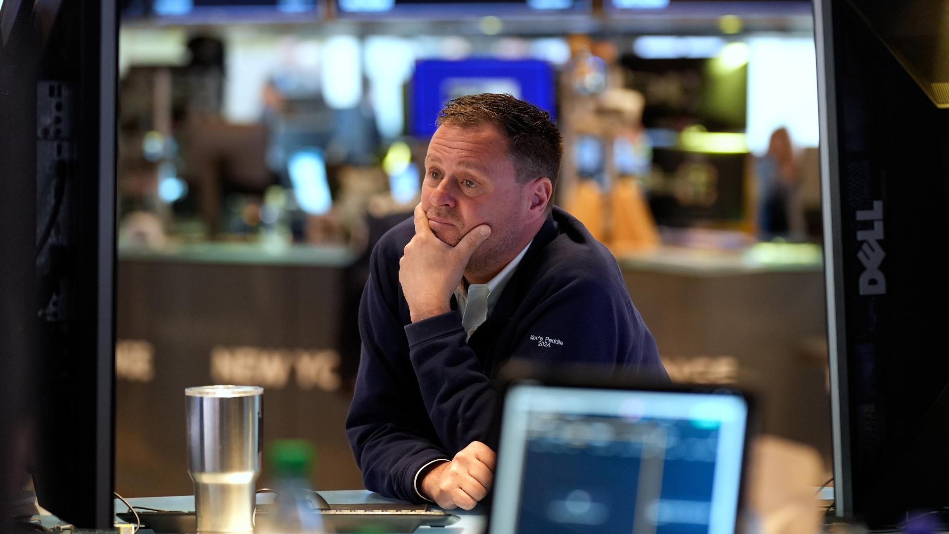 US stocks dip after careening through a manic day following Trump's ...