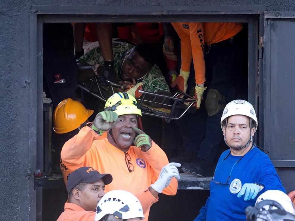 At least 221 dead, including former MLB pitcher, in roof collapse at ...