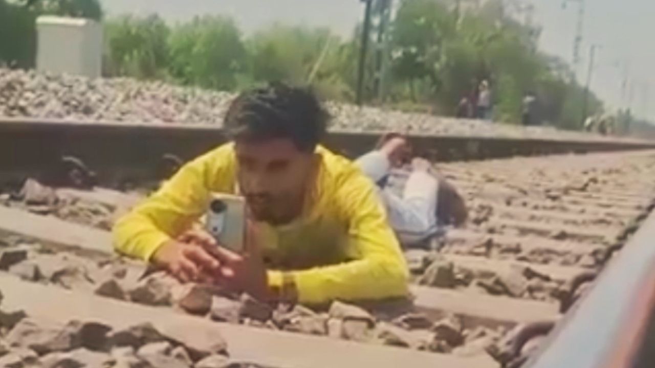 Reckless boy detained for filming high-speed train from railway tracks