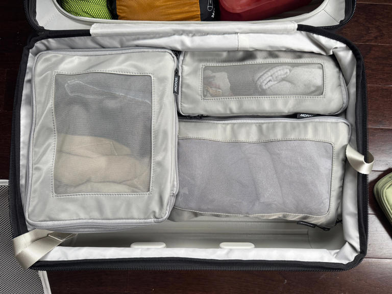 I never travel without these Monos compressible packing cubes, which ...