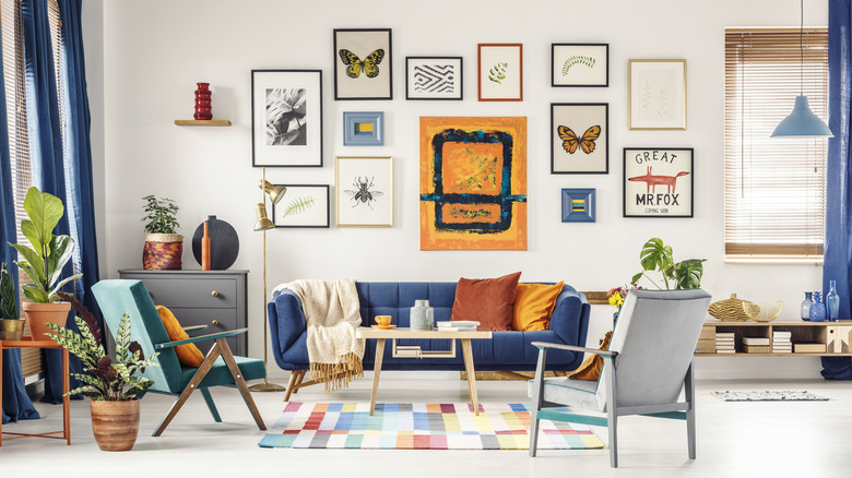 Why You Should Add A Shelf To Your Gallery Wall