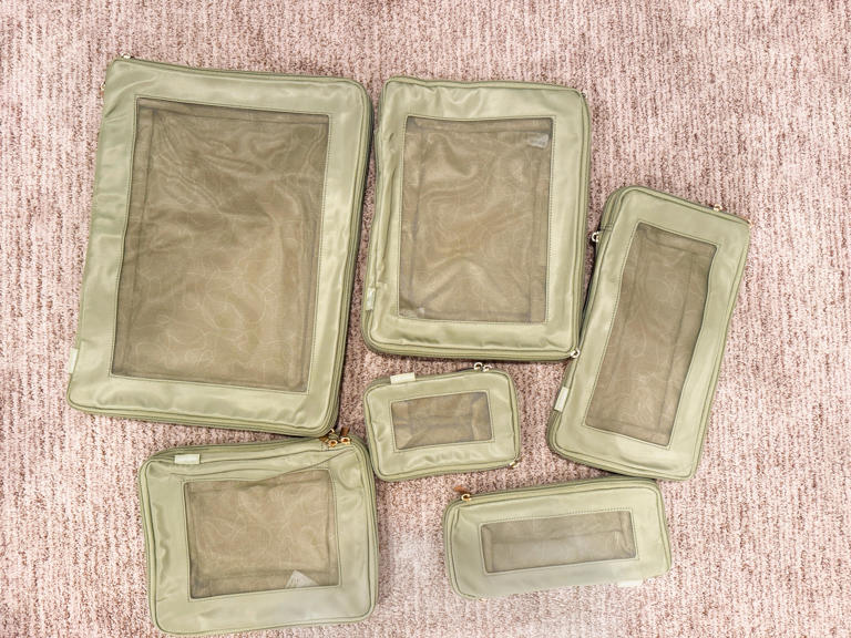 I never travel without these Monos compressible packing cubes, which ...