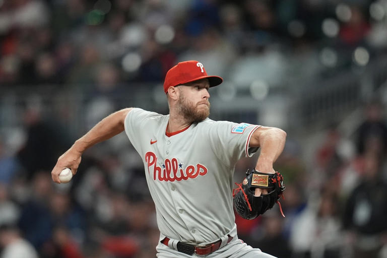 Murphy homers in his return from a rib injury as the Braves beat the Phillies 7-5