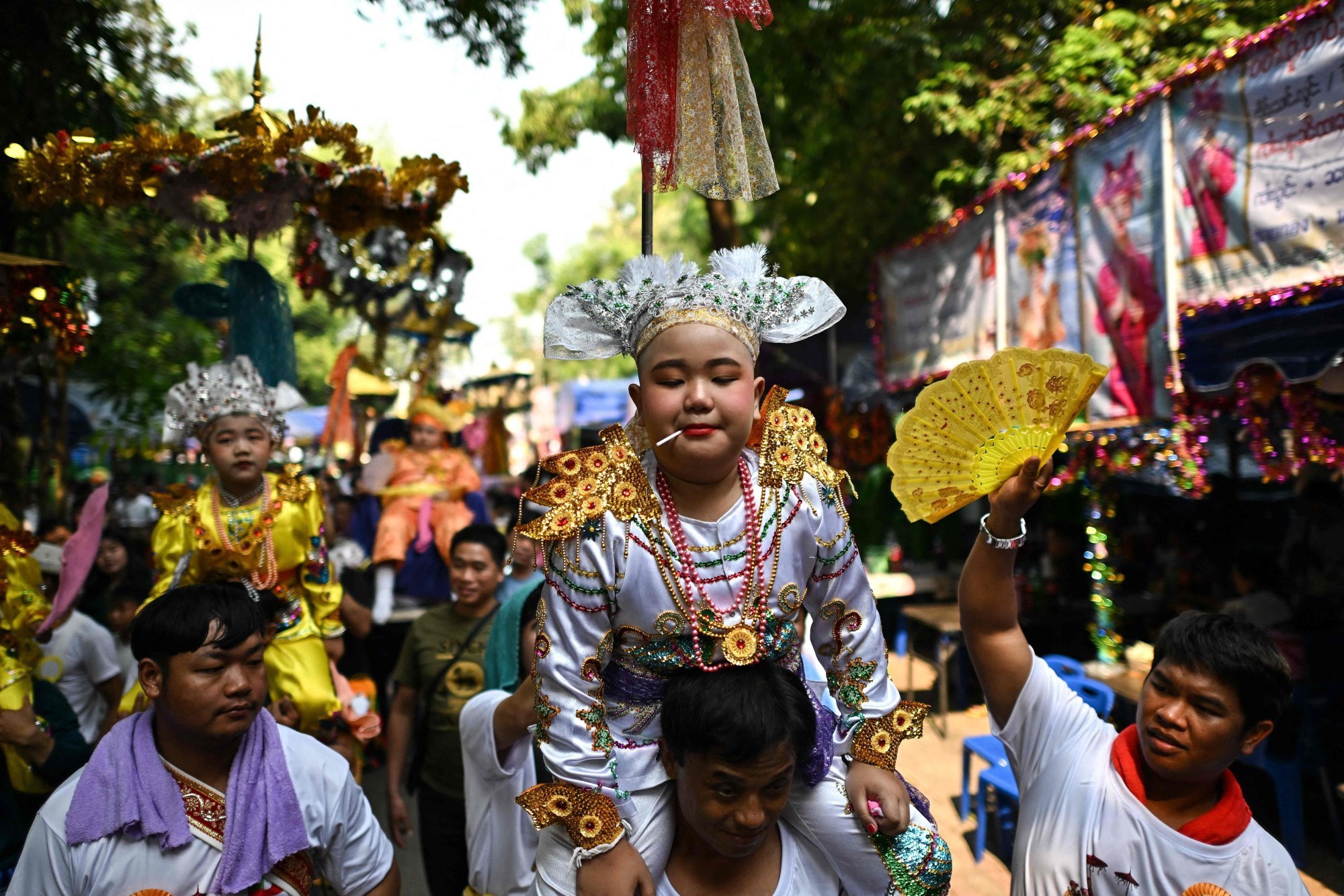 Photos of vivid Buddhist celebration in Thailand that’s a rite of ...