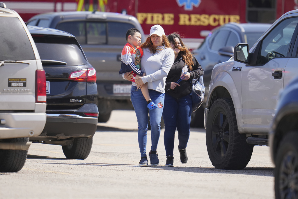 Suspect in shooting at Dallas high school is in custody, officials say