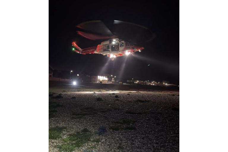 Emergency services rescue three people stuck in the mud in Hayling ...