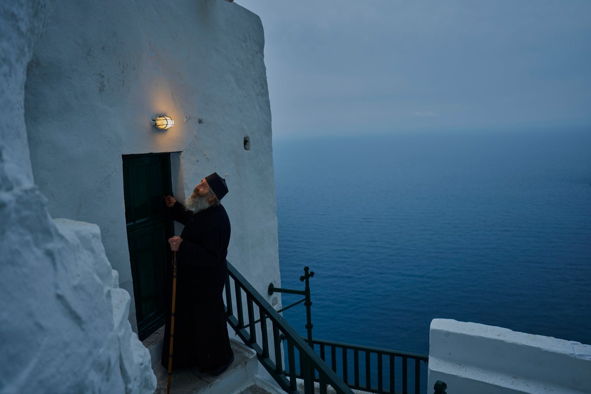 Meet the monk who lives in the cliffs on a Greek holiday island