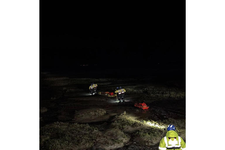 Emergency services rescue three people stuck in the mud in Hayling ...