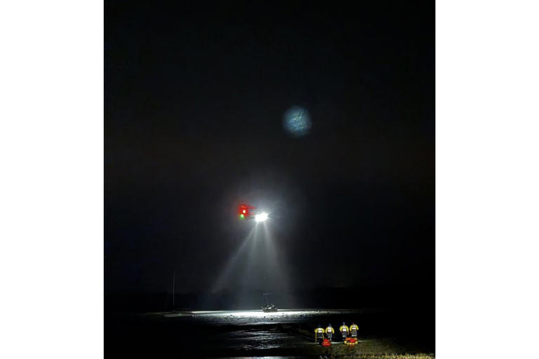 Emergency services rescue three people stuck in the mud in Hayling ...