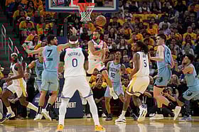 Butler hails 'Batman' Curry after Warriors reach NBA playoffs