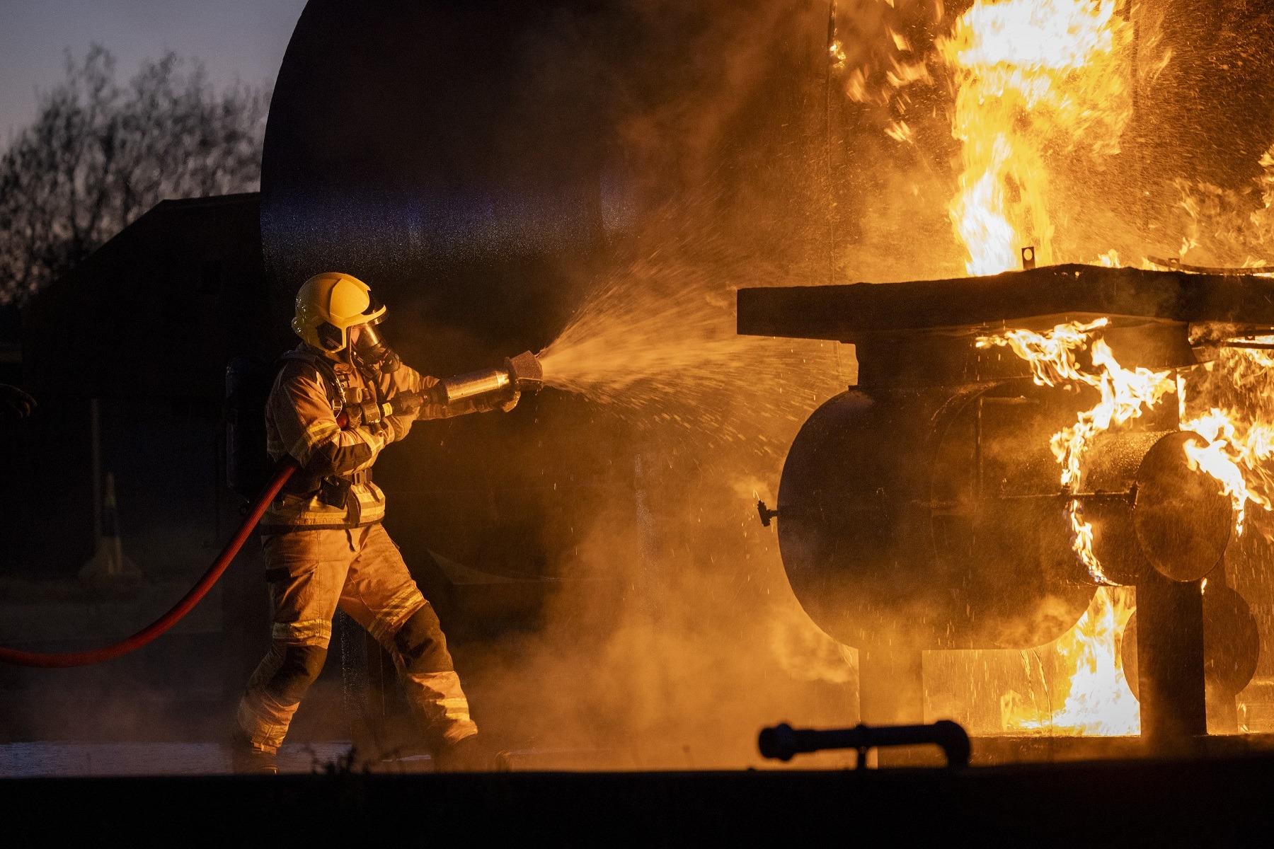 RAF firefighters beating the flames