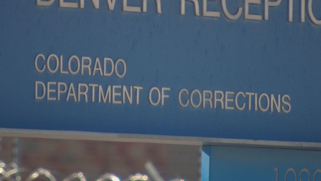 Charges filed against two Colorado Department of Corrections employees