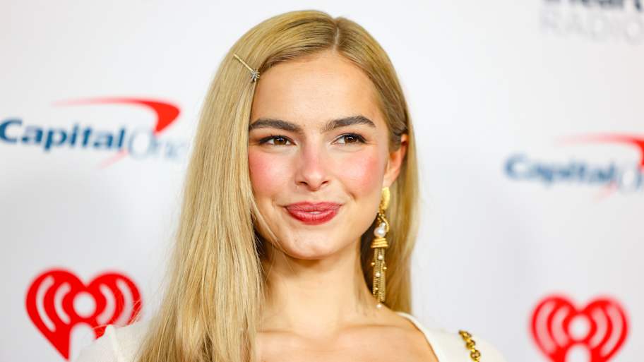 Addison Rae Channels Pop Star Alter Ego in Bold Pink Wig, Teases New Music