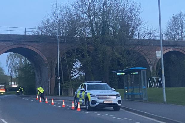 Police cone off bus stop outside city arena