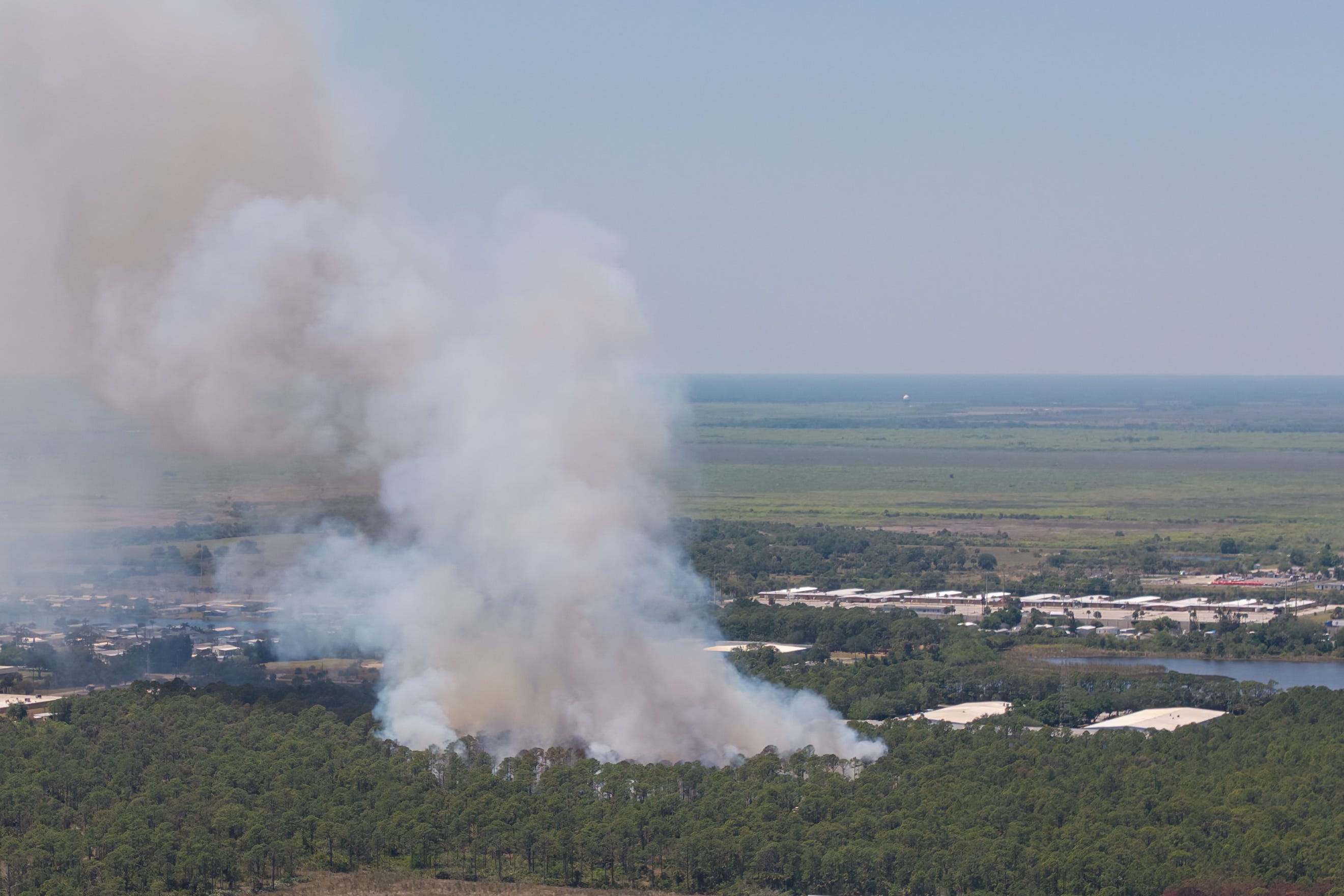 Fast-moving brush fire shuts down Melbourne roadway near Interstate 95