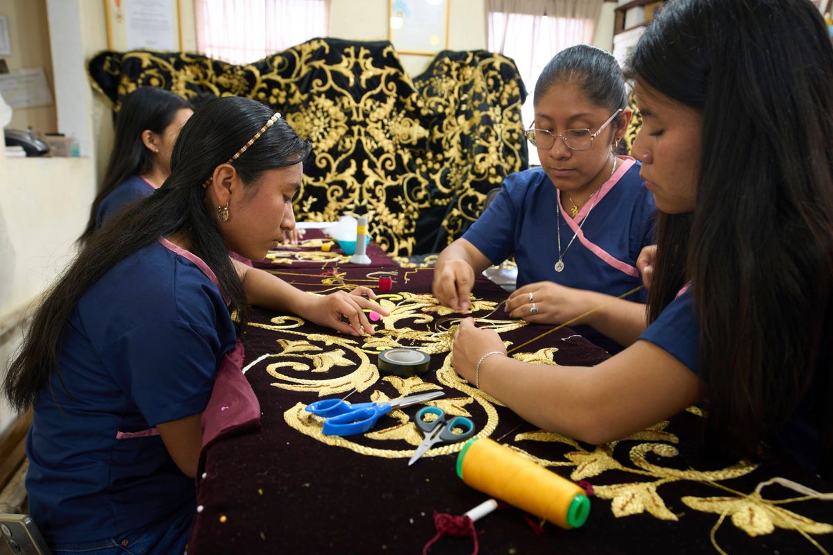 Artisans in Guatemala hand-stitch velvet cloaks for Holy Week processions