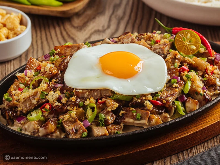 How to Make Filipino Sizzling Sisig (Crispy Pork with Eggs)