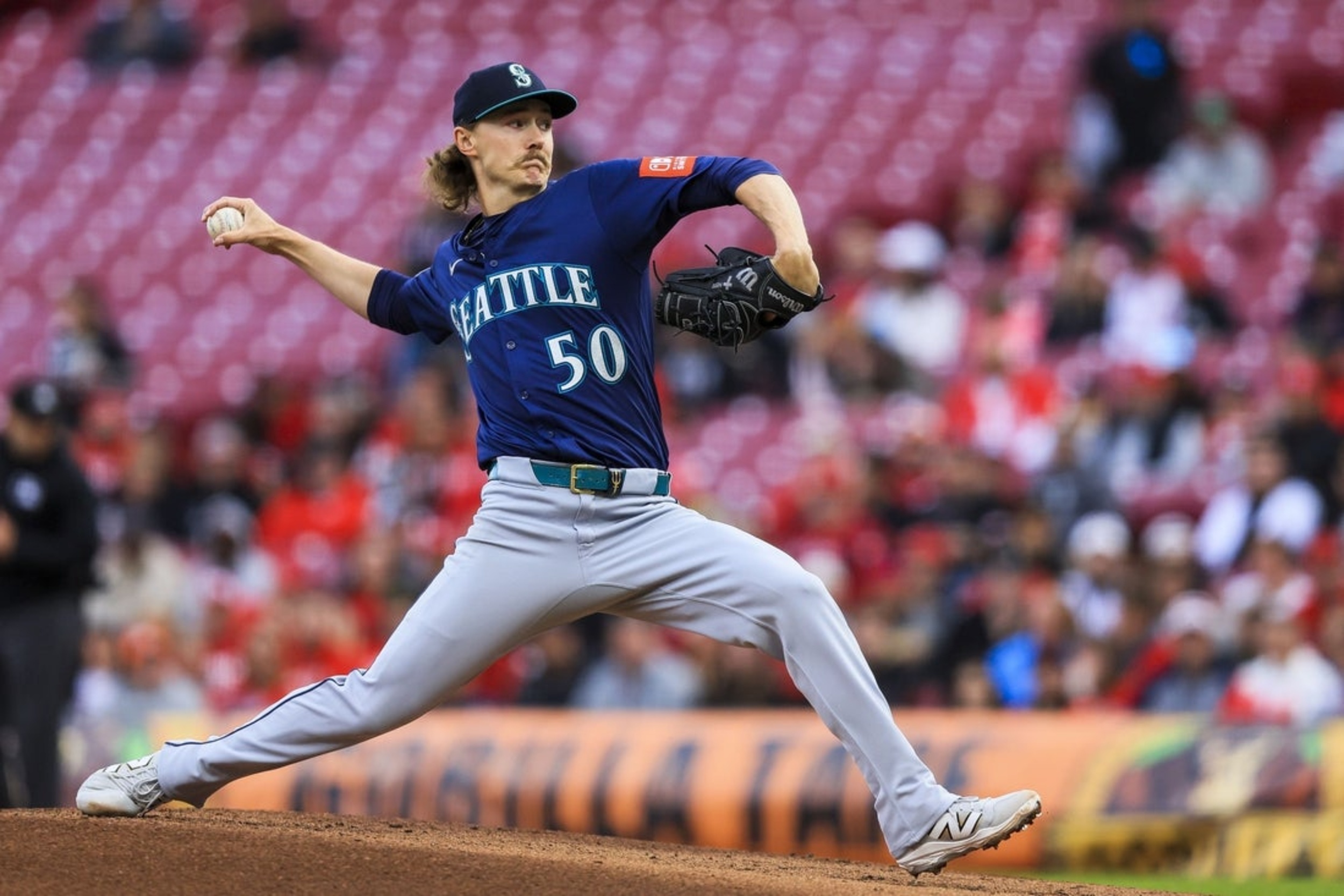 Cal Raleigh homers twice to back Bryce Miller as Mariners top Reds