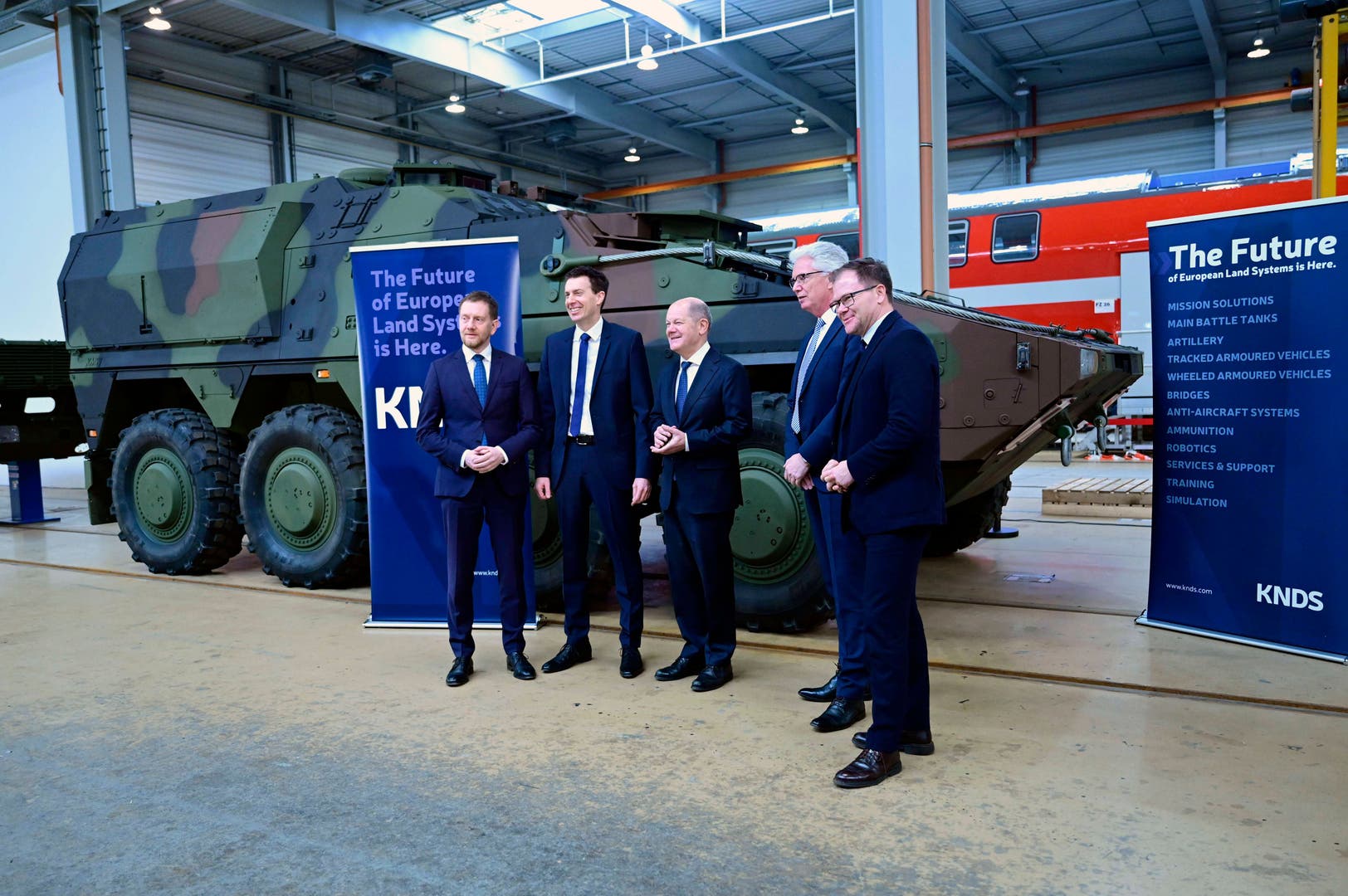 INSIDE EUROPE - Germany shifts gears as auto slump meets defense boom