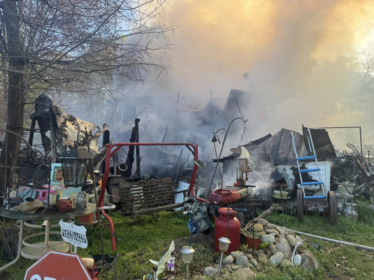 PHOTOS: Crews battle house fire with ‘severe hoarder conditions’ in ...