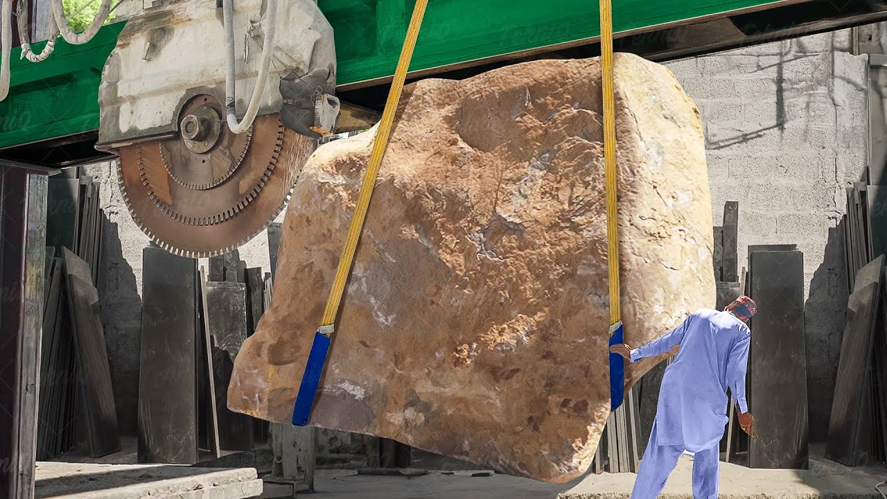 The process of cutting large rocks to create high-quality marble slabs